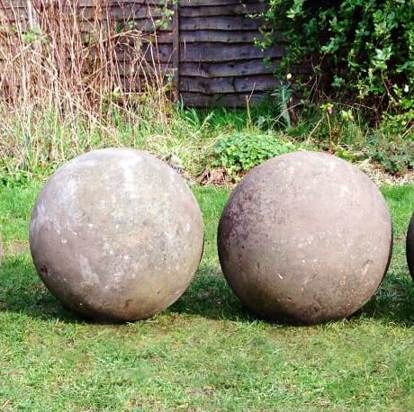 Four English antique stone balls with good patination – European Antiques